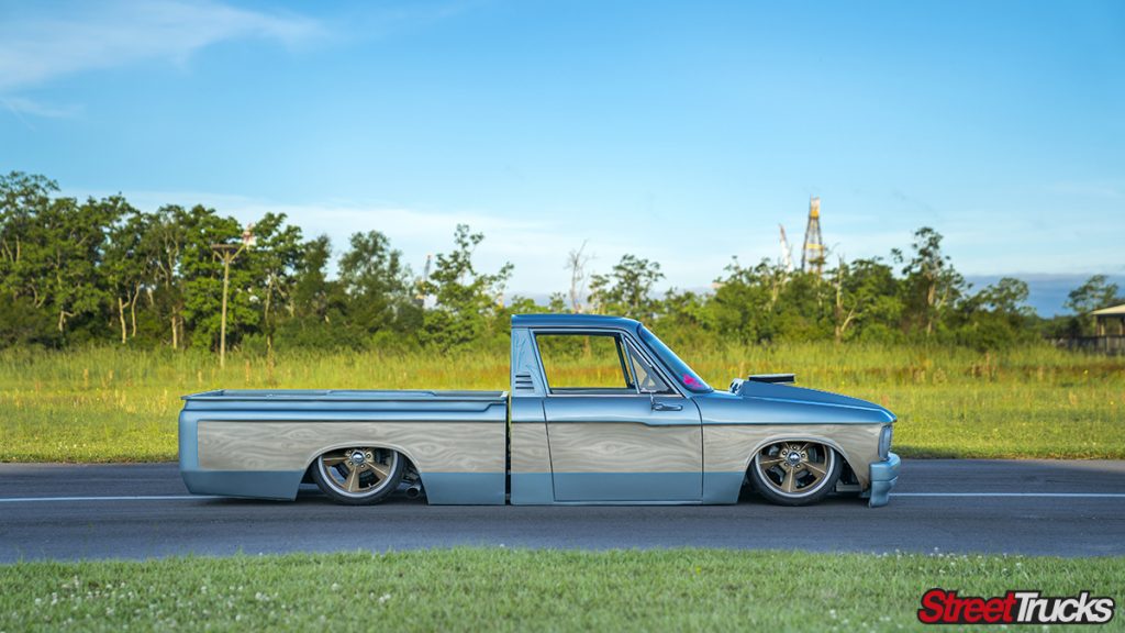 1973 Chevy LUV bodydropped on air with an S10 engine and bumpers!